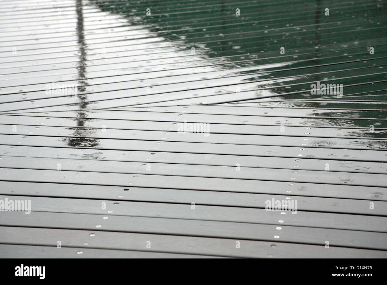 Boardwalk in Rain Stock Photo - Alamy