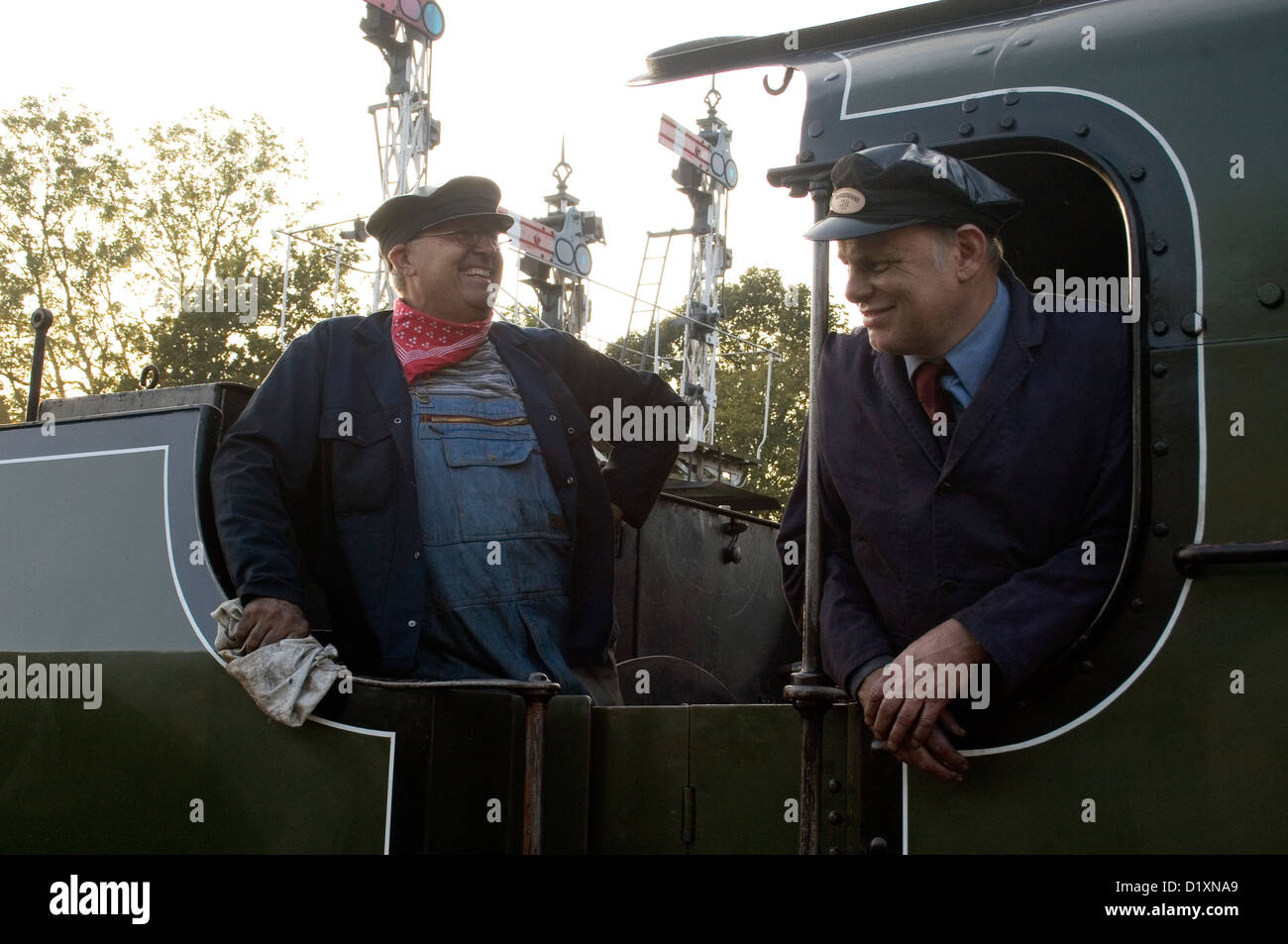 The fireman and driver on a steam engine in the UK Stock Photo - Alamy