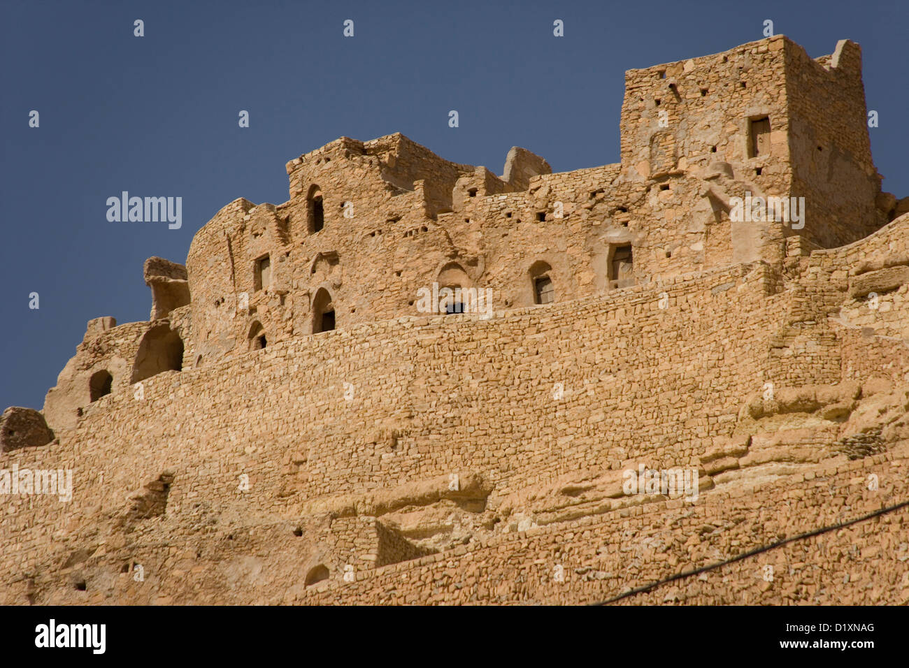 The Berber village of Chenini nearTatouine in the Sahara desert in ...