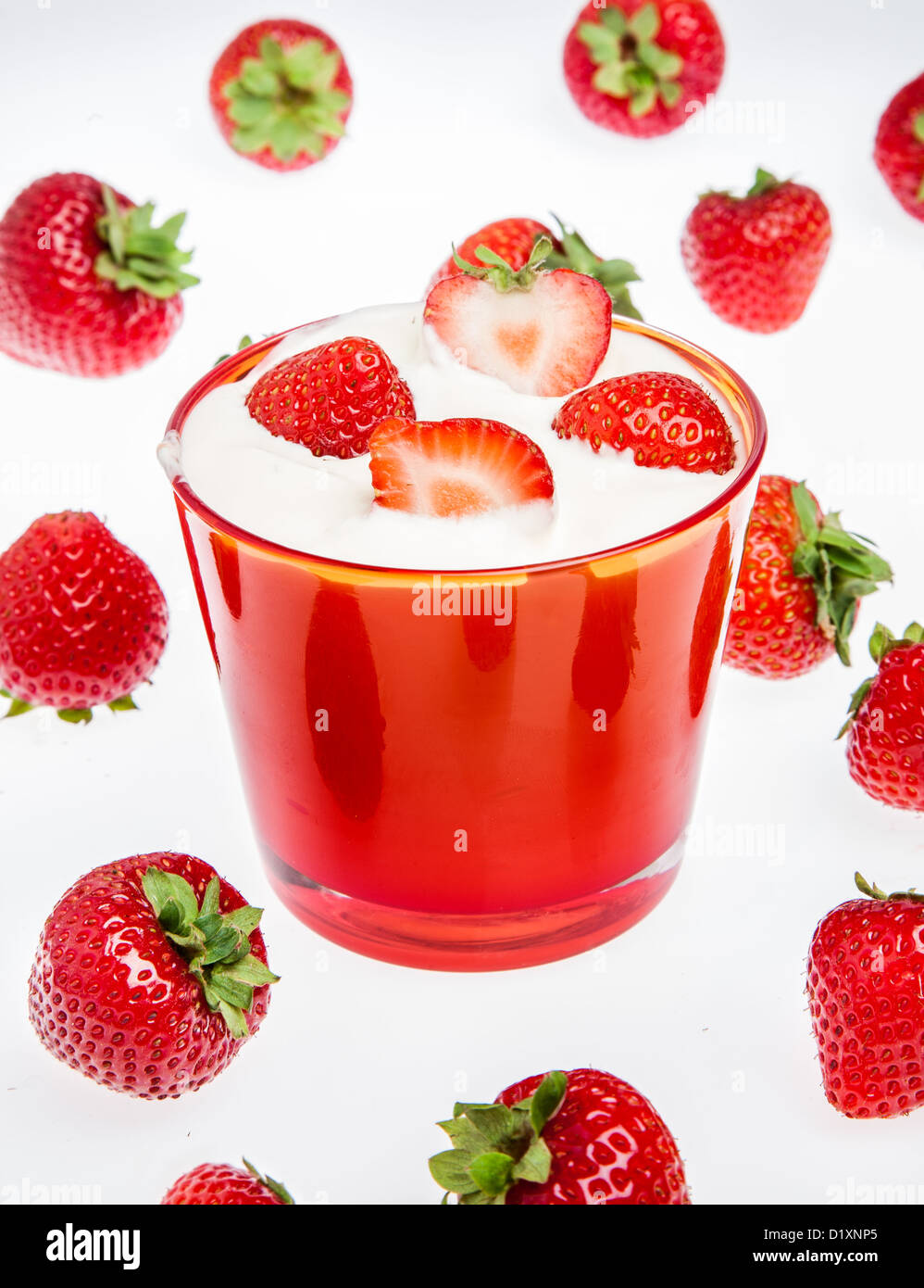 Strawberry with cream on a white background Stock Photo - Alamy