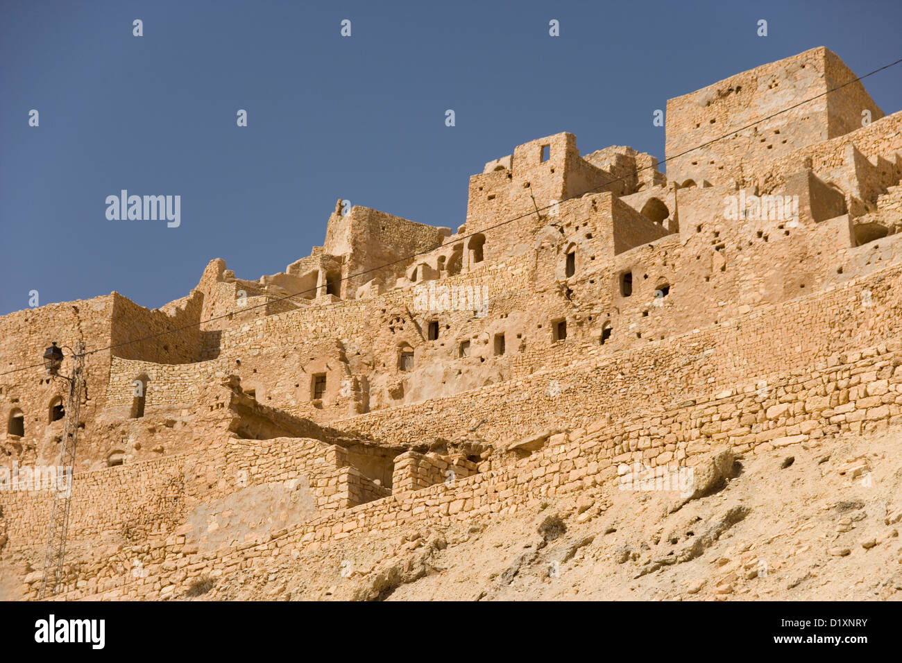 The Berber village of Chenini nearTatouine in the Sahara desert in ...