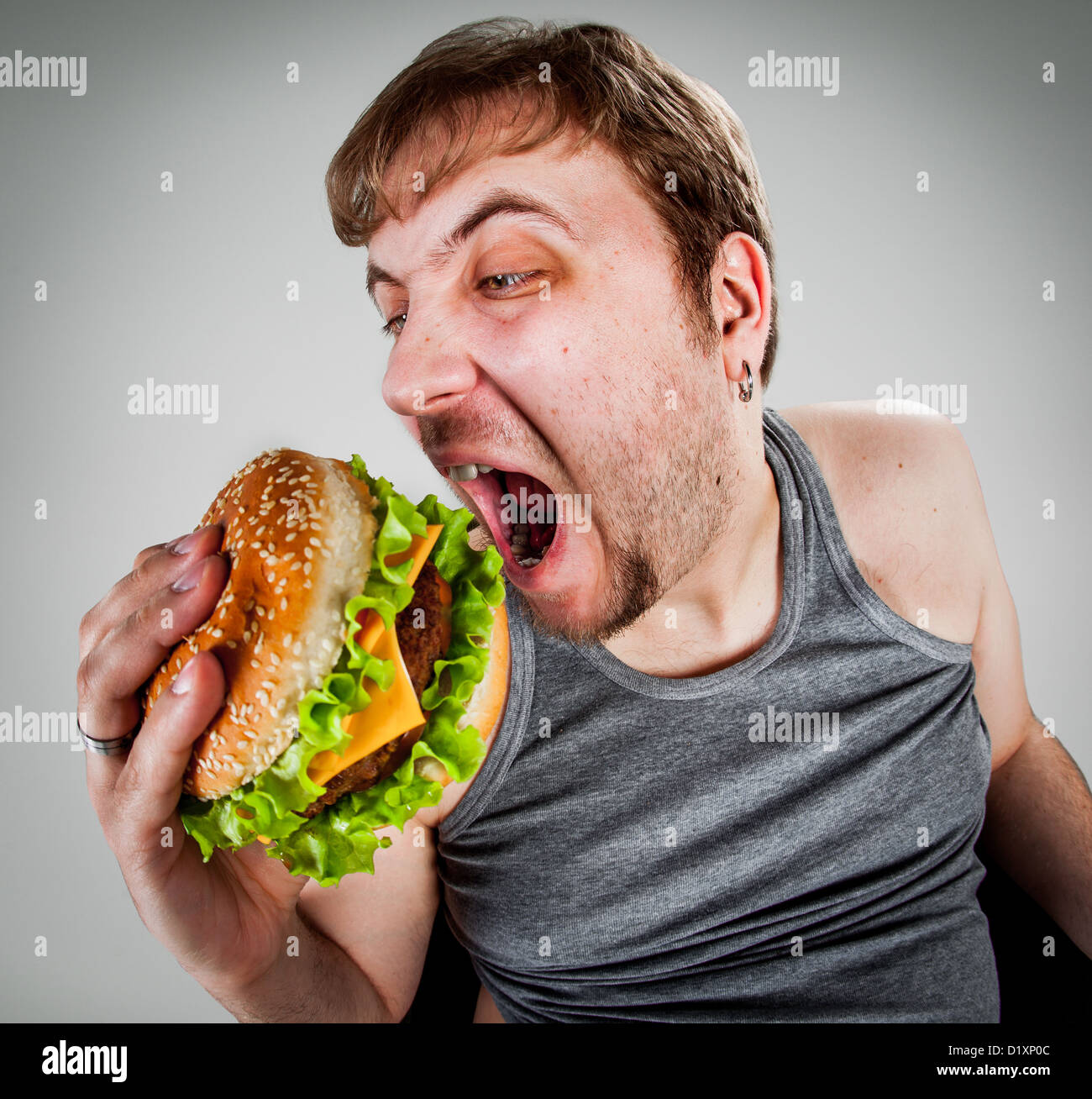 Overweight man eating hi-res stock photography and images - Alamy