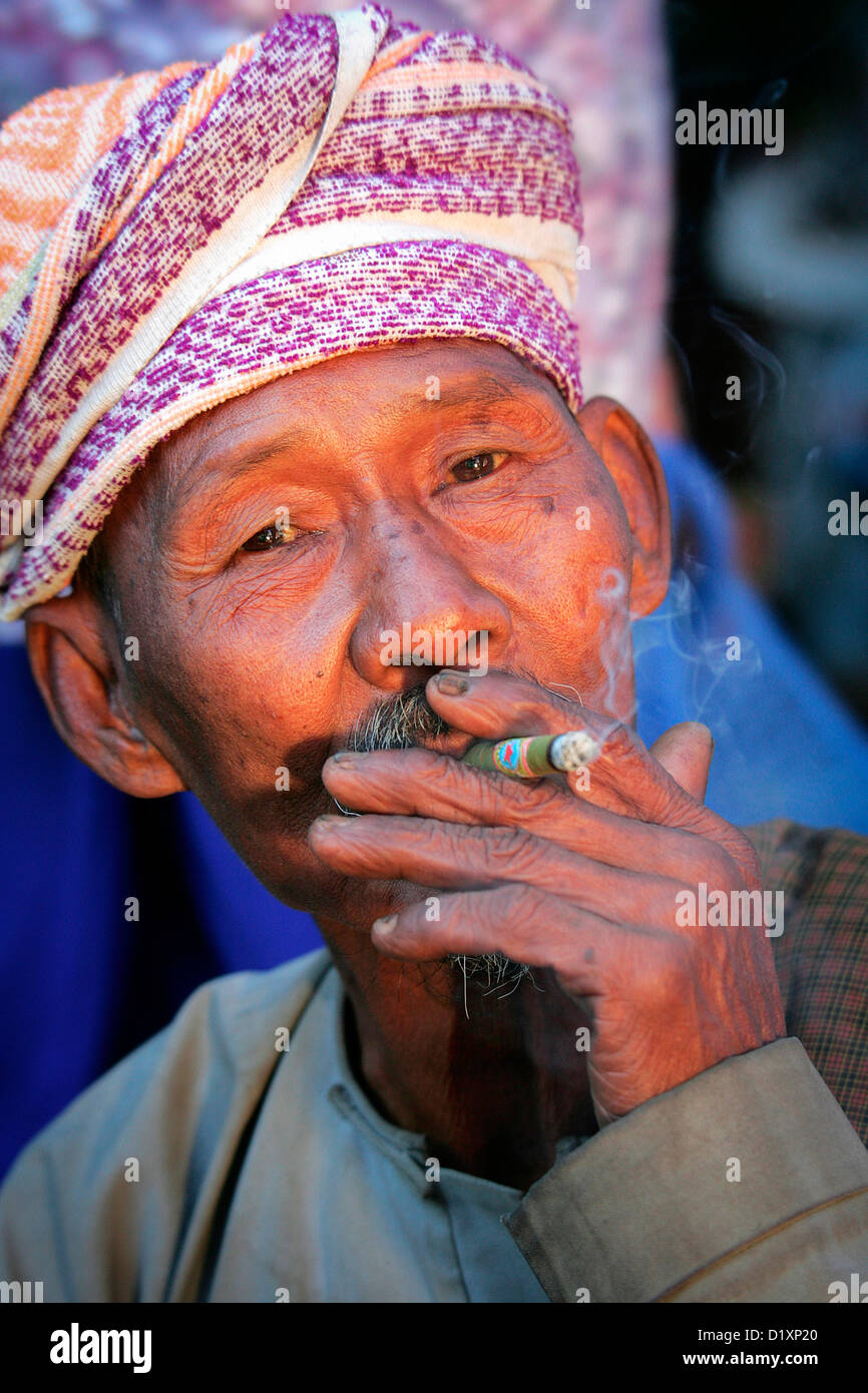 Portrait of a local man in the market at the hill station of Maymyo ...