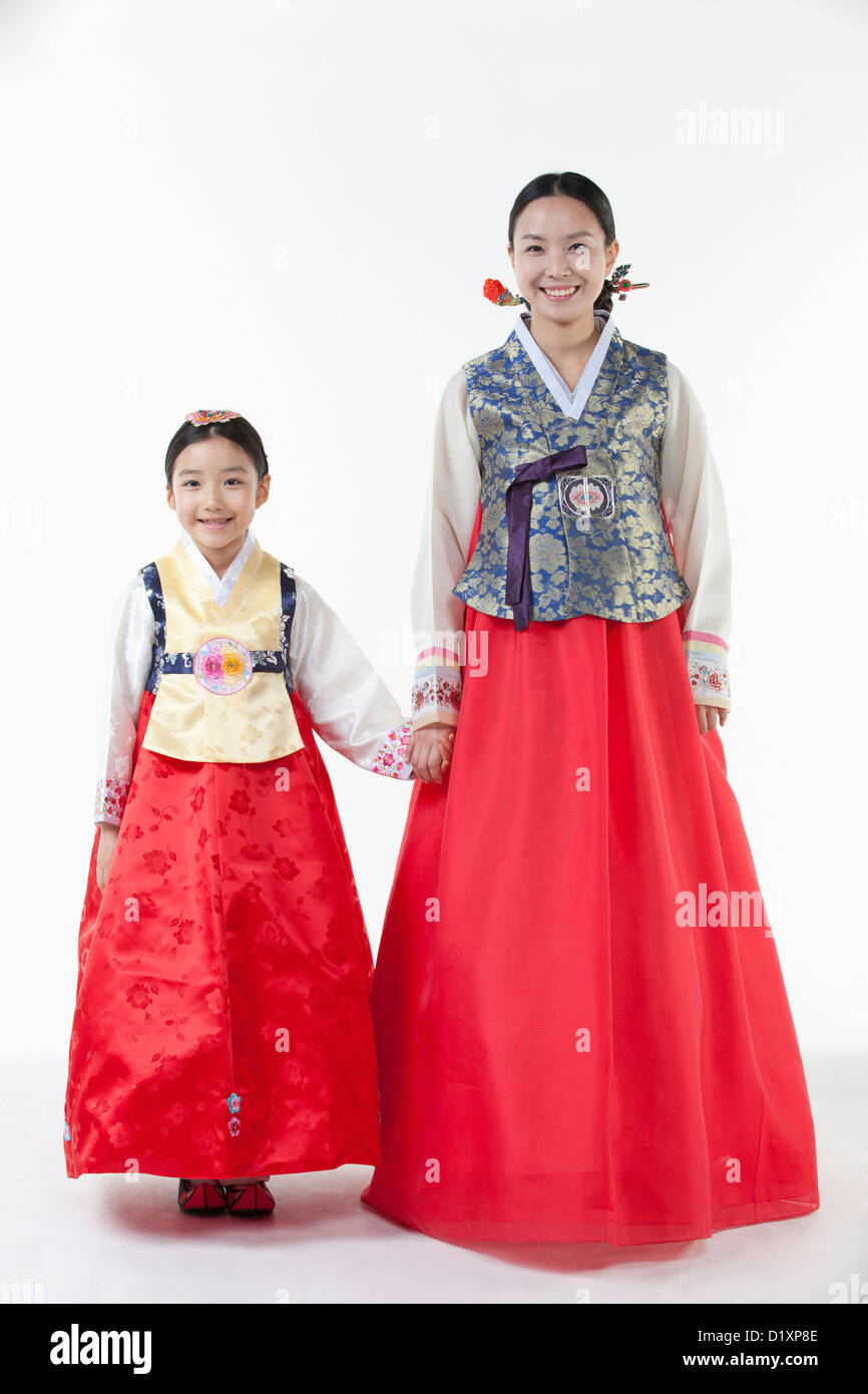 a mother and a daughter wearing Hanbok dress Stock Photo - Alamy