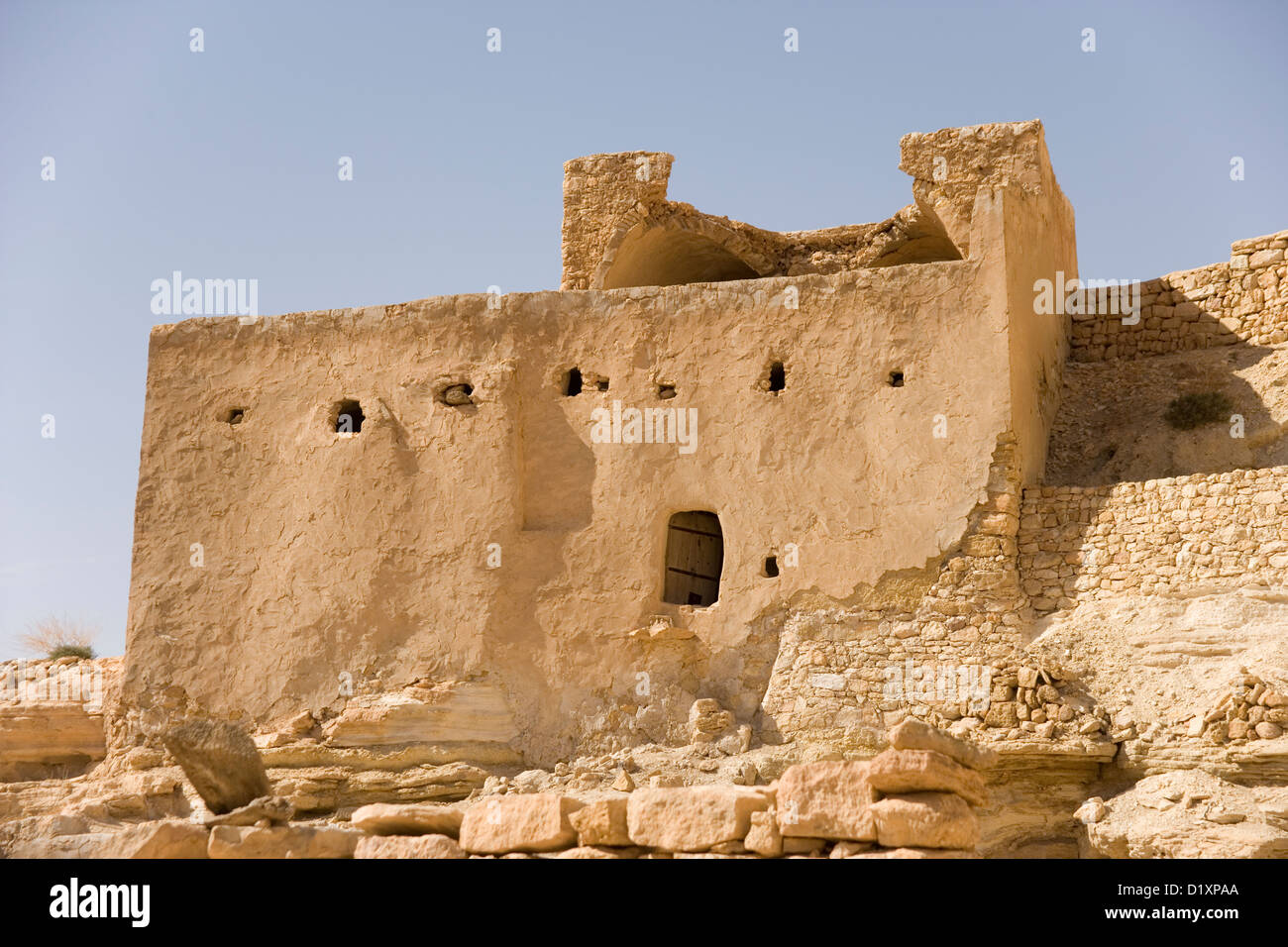 The Berber village of Chenini nearTatouine in the Sahara desert in ...