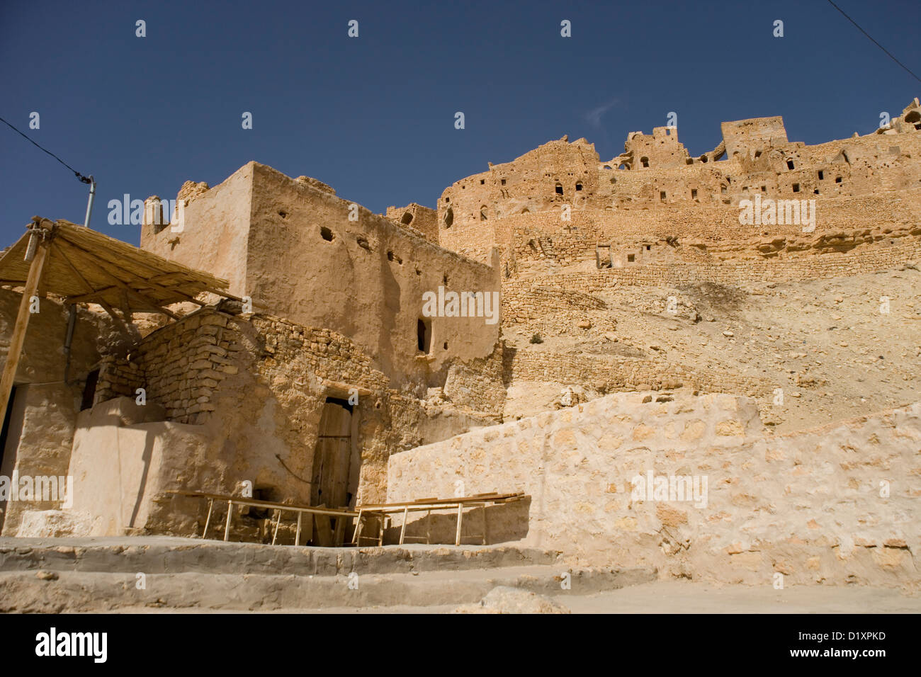 The Berber village of Chenini nearTatouine in the Sahara desert in ...
