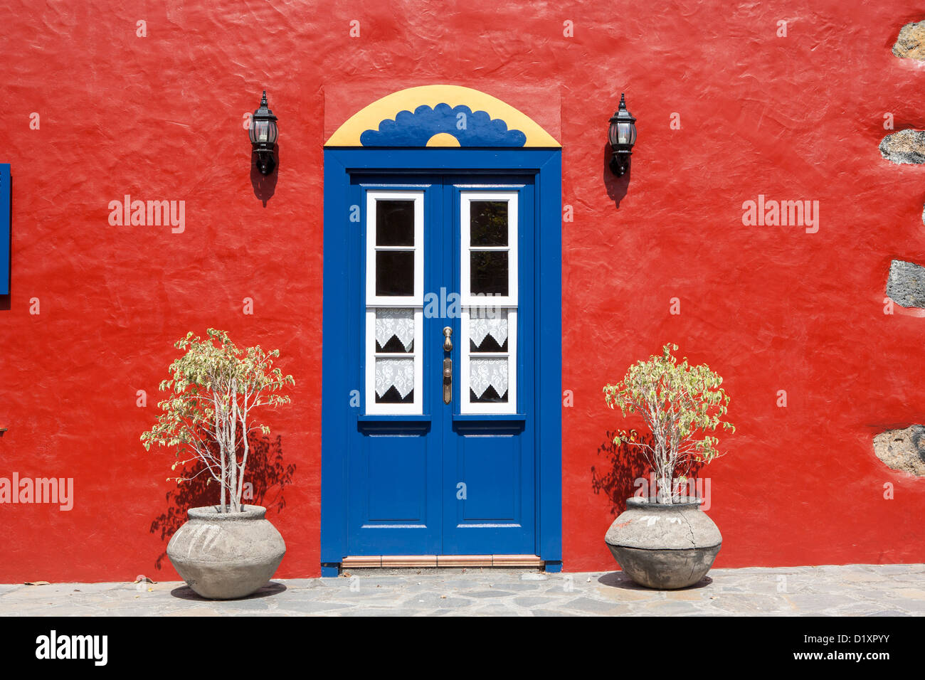 Red house blue windows canary islands hi-res stock photography and ...