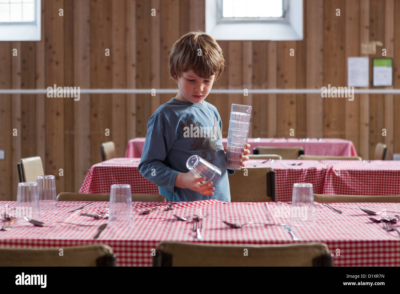 Child setting table chores hi-res stock photography and images - Alamy