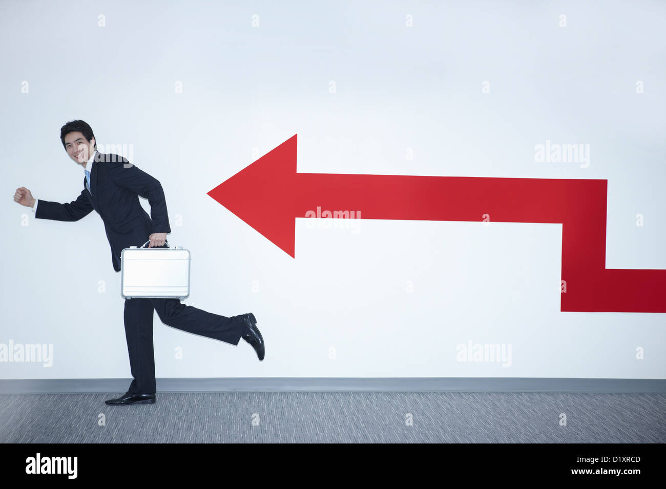 Businessman running red arrow hi-res stock photography and images - Alamy