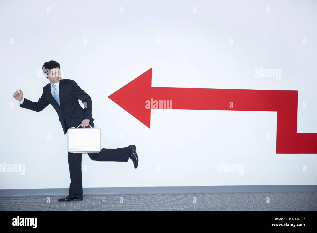 Businessman running red arrow hi-res stock photography and images - Alamy