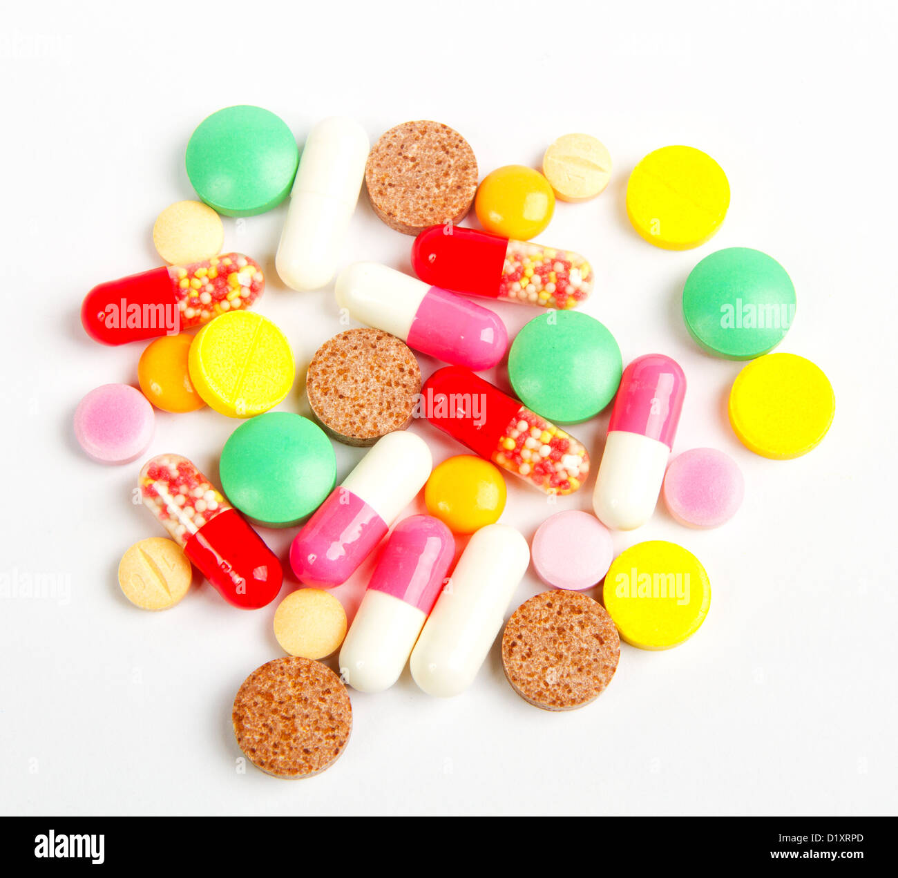 colorful pills isolated on white background Stock Photo - Alamy