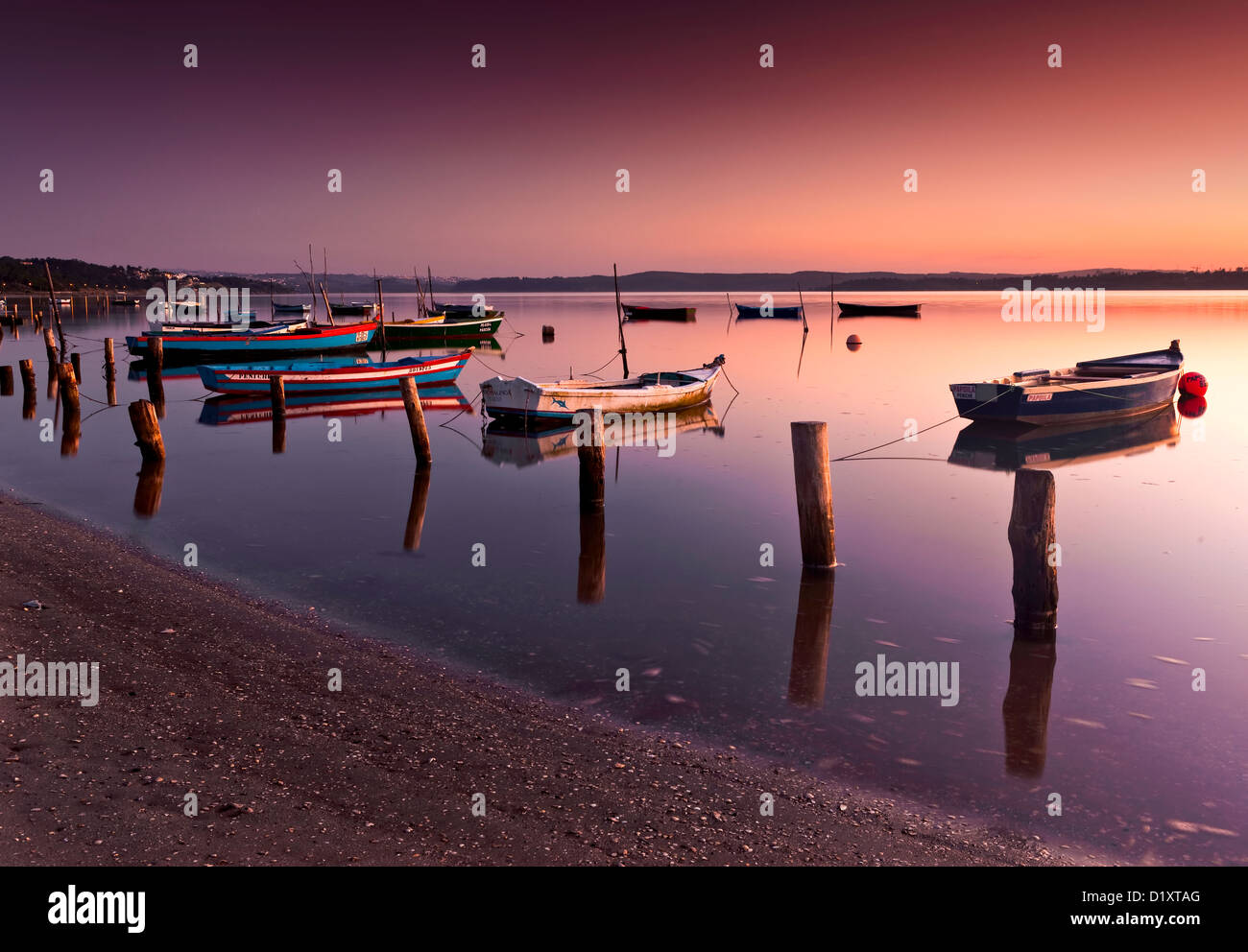 Beautiful landscape of a river and boats at sunset Stock Photo - Alamy