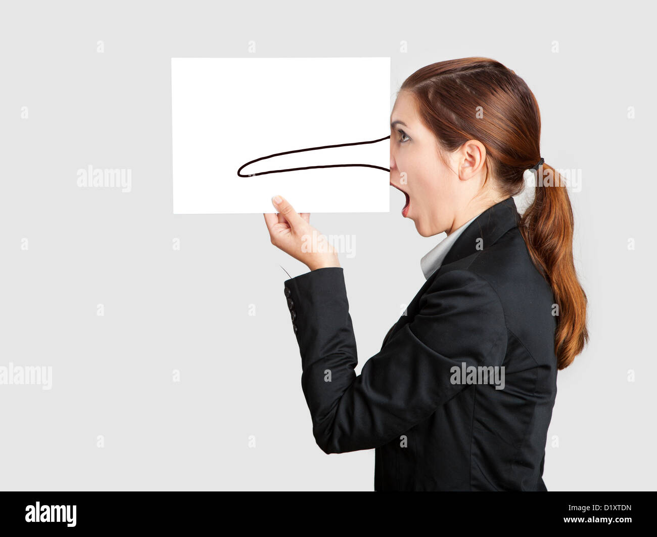 Woman holding a paper sheet with a sketch of Pinocchio nose on it Stock ...