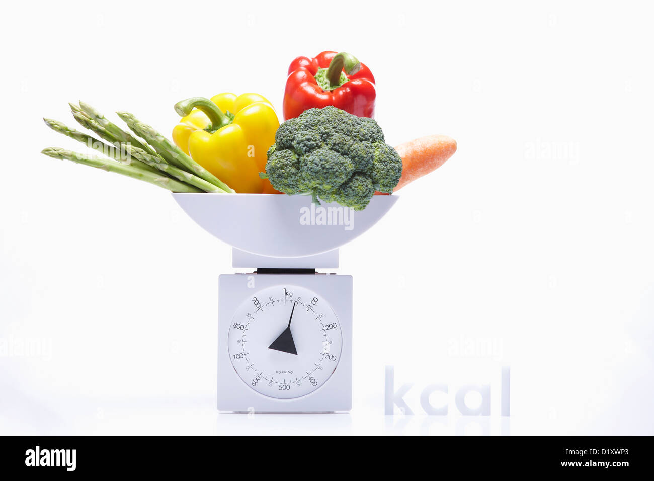 vegetables on a measuring scale Stock Photo - Alamy