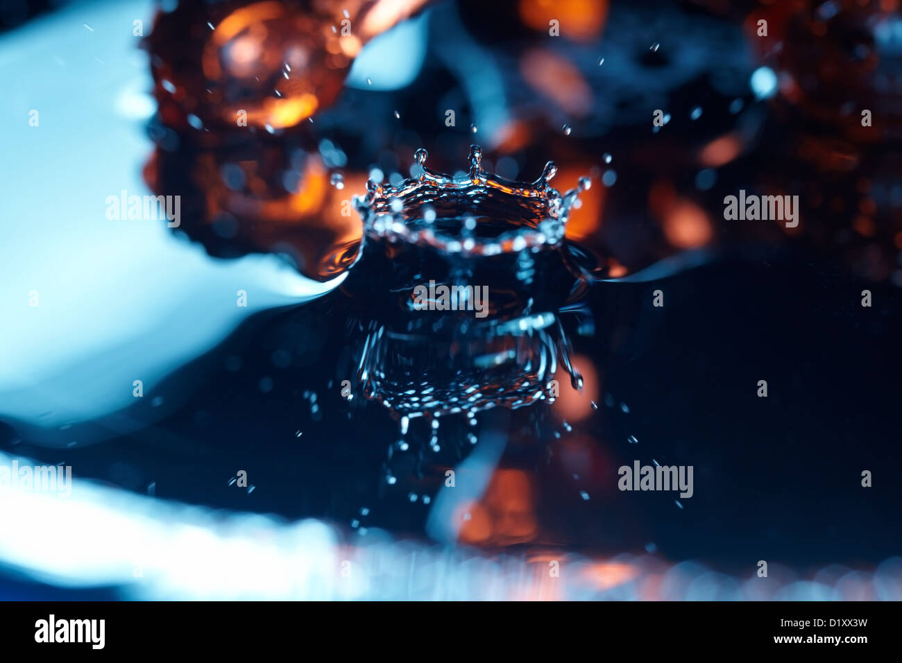 Splashing drop in the liquid. Extremely close-up photo Stock Photo - Alamy