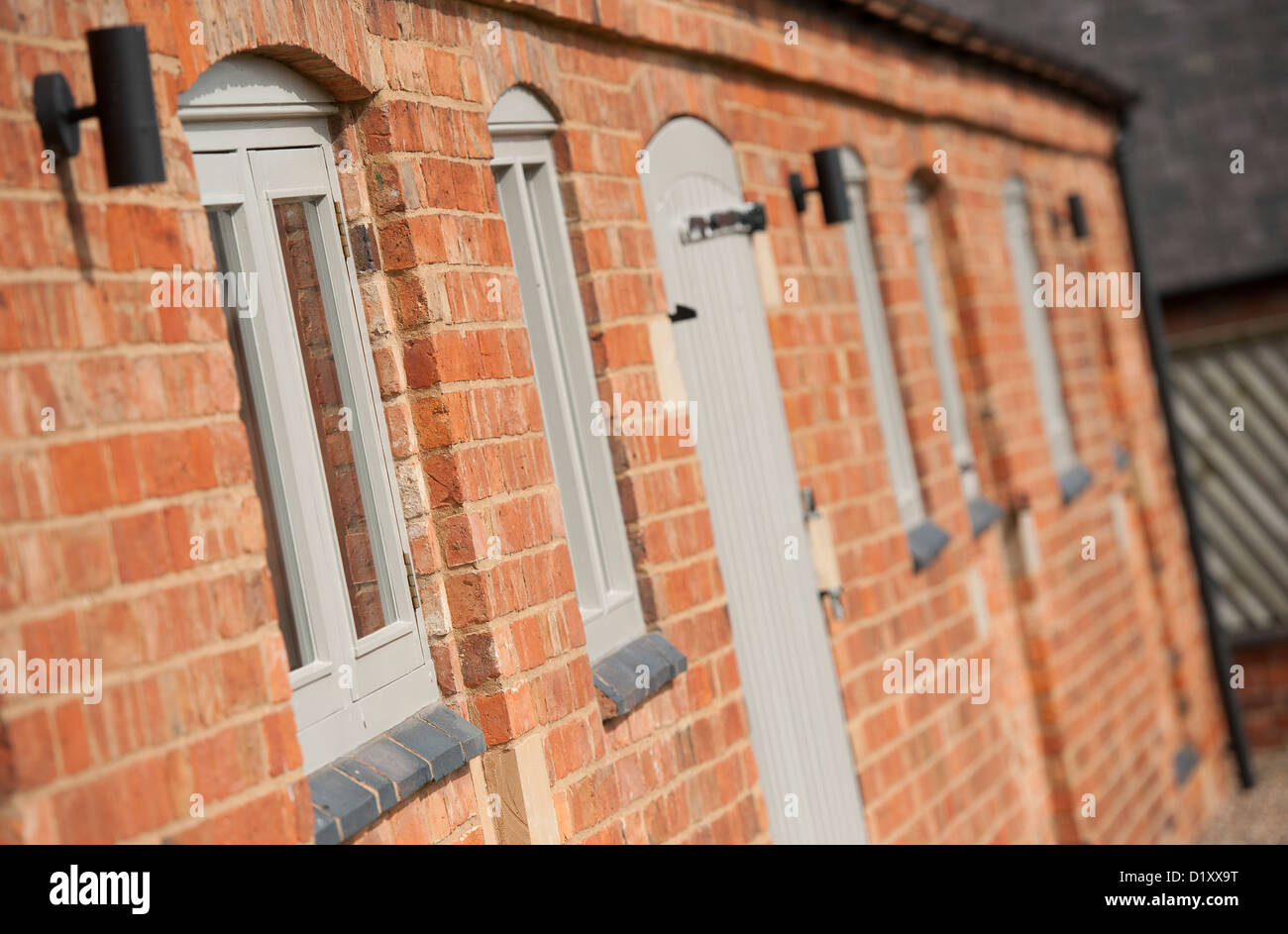 Close up view of a beautifully converted barn in the English ...
