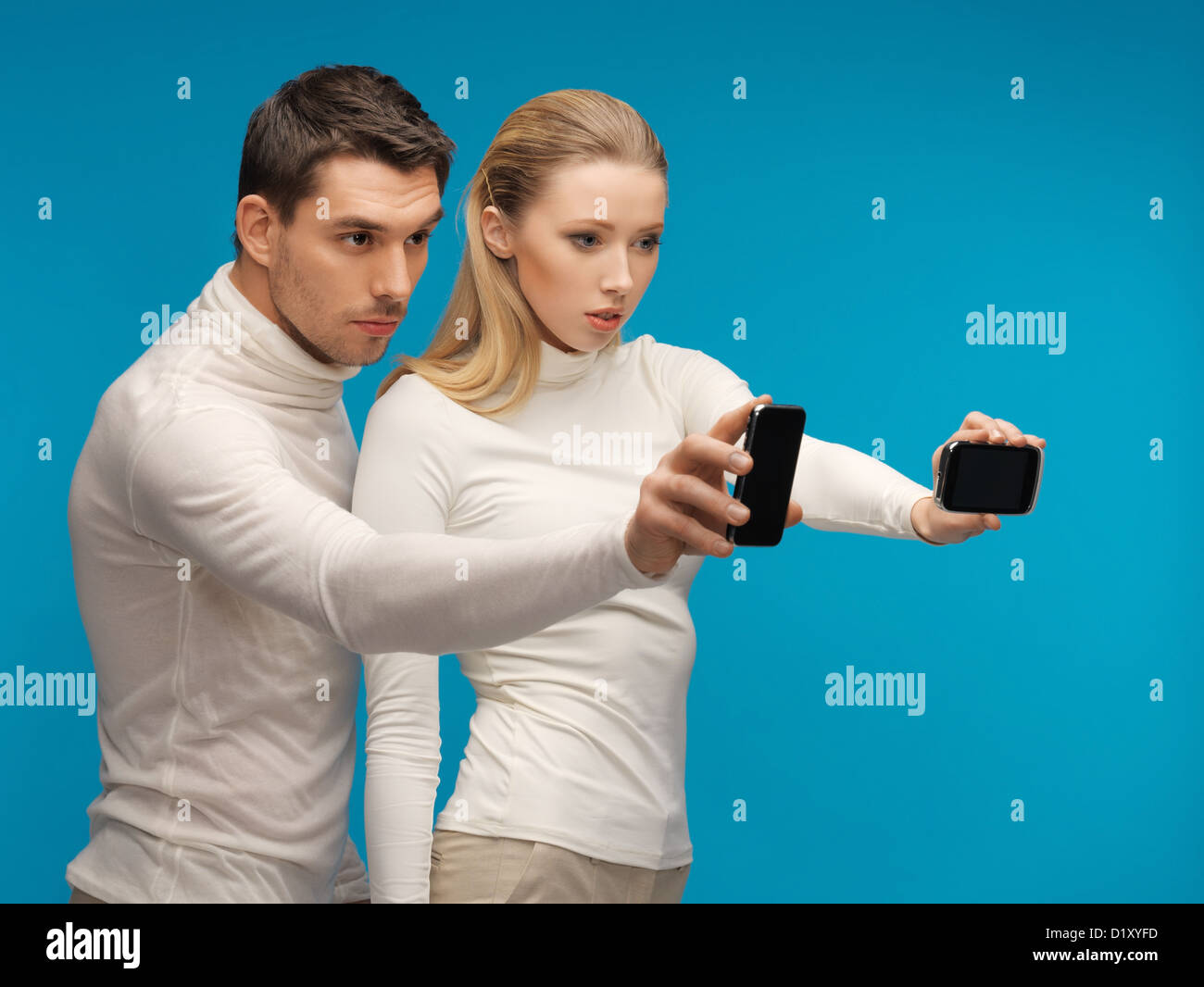 man and woman with modern gadgets Stock Photo - Alamy
