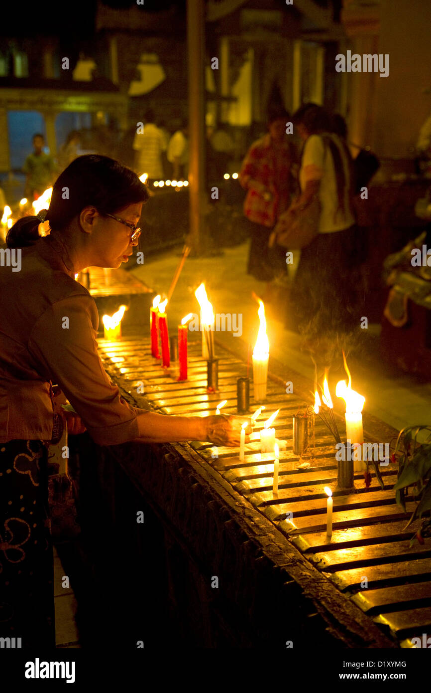Buddhist myanmar candle hi-res stock photography and images - Alamy