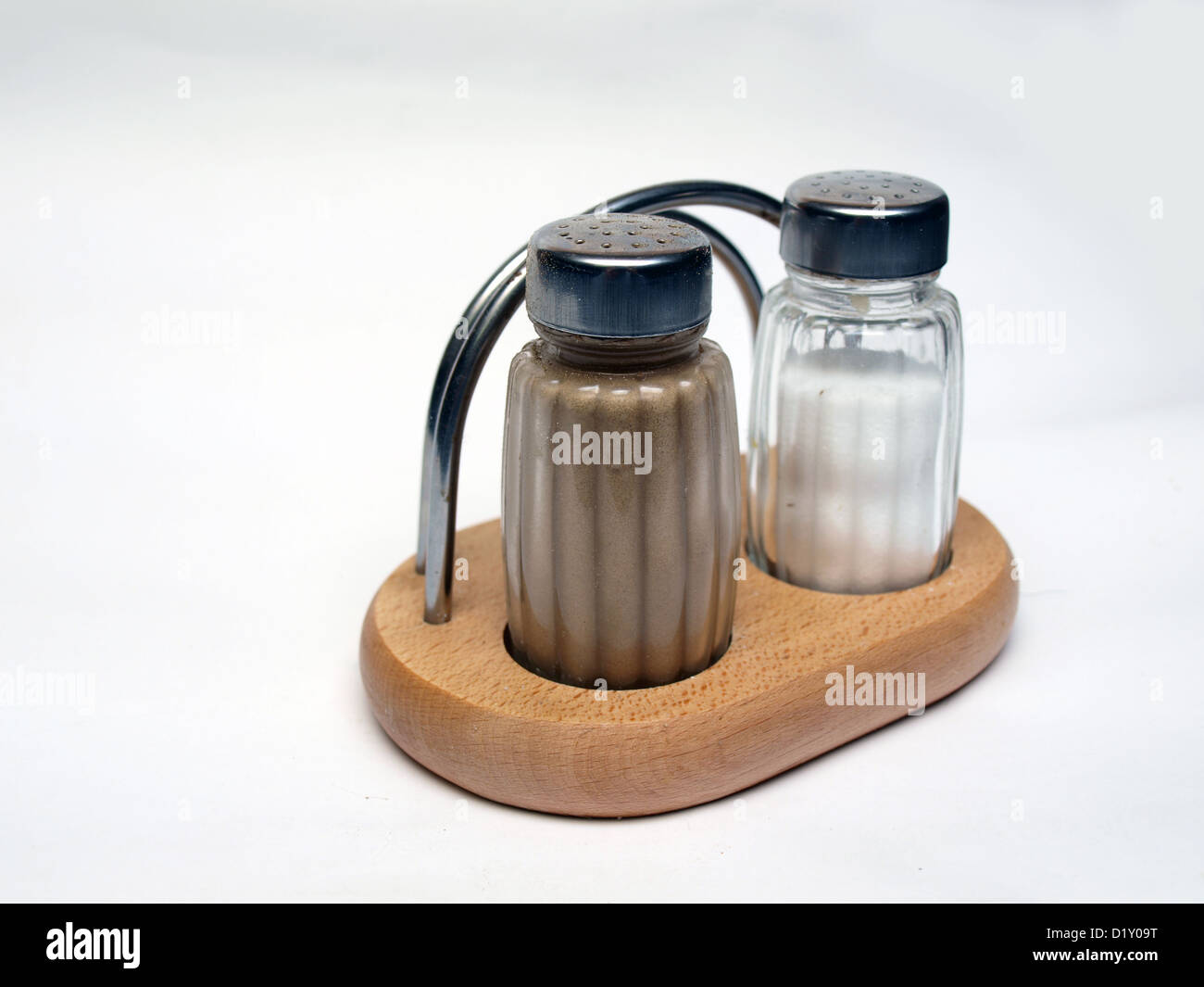 Set of salt and pepper in two small glass jars Stock Photo - Alamy