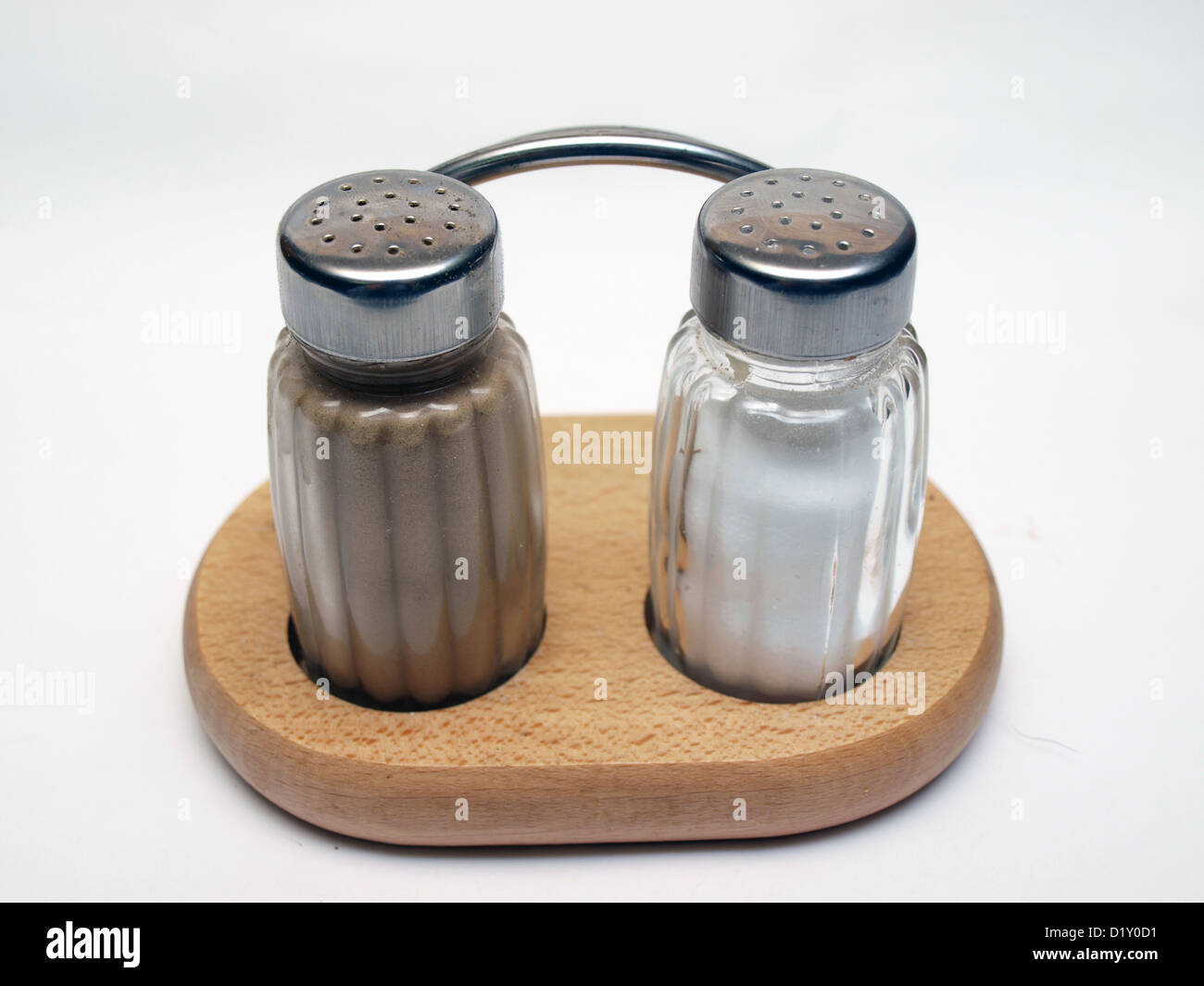 Set of salt and pepper in two small glass jars Stock Photo - Alamy