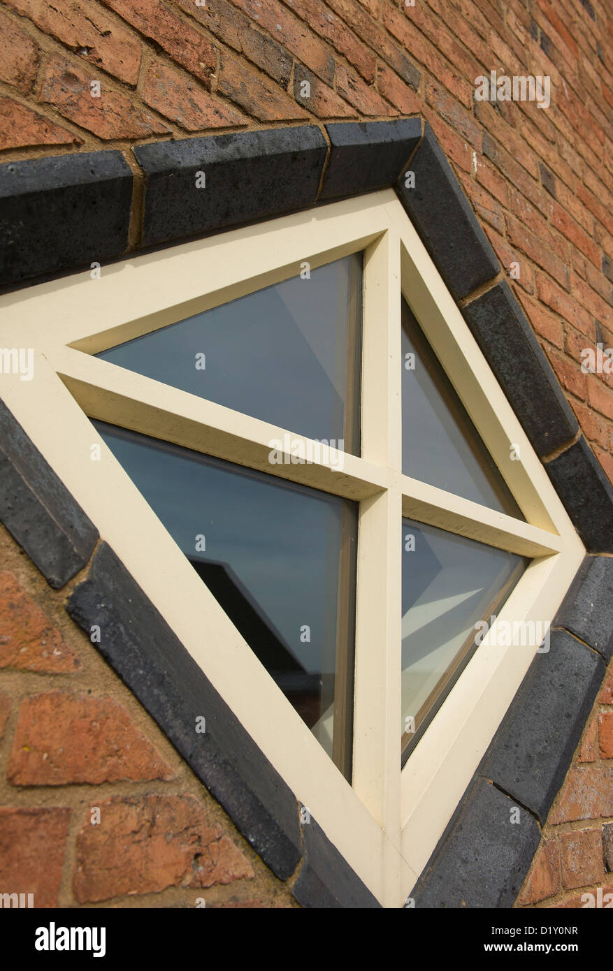 Close up view of a diamond shaped window on a newly converted barn in ...