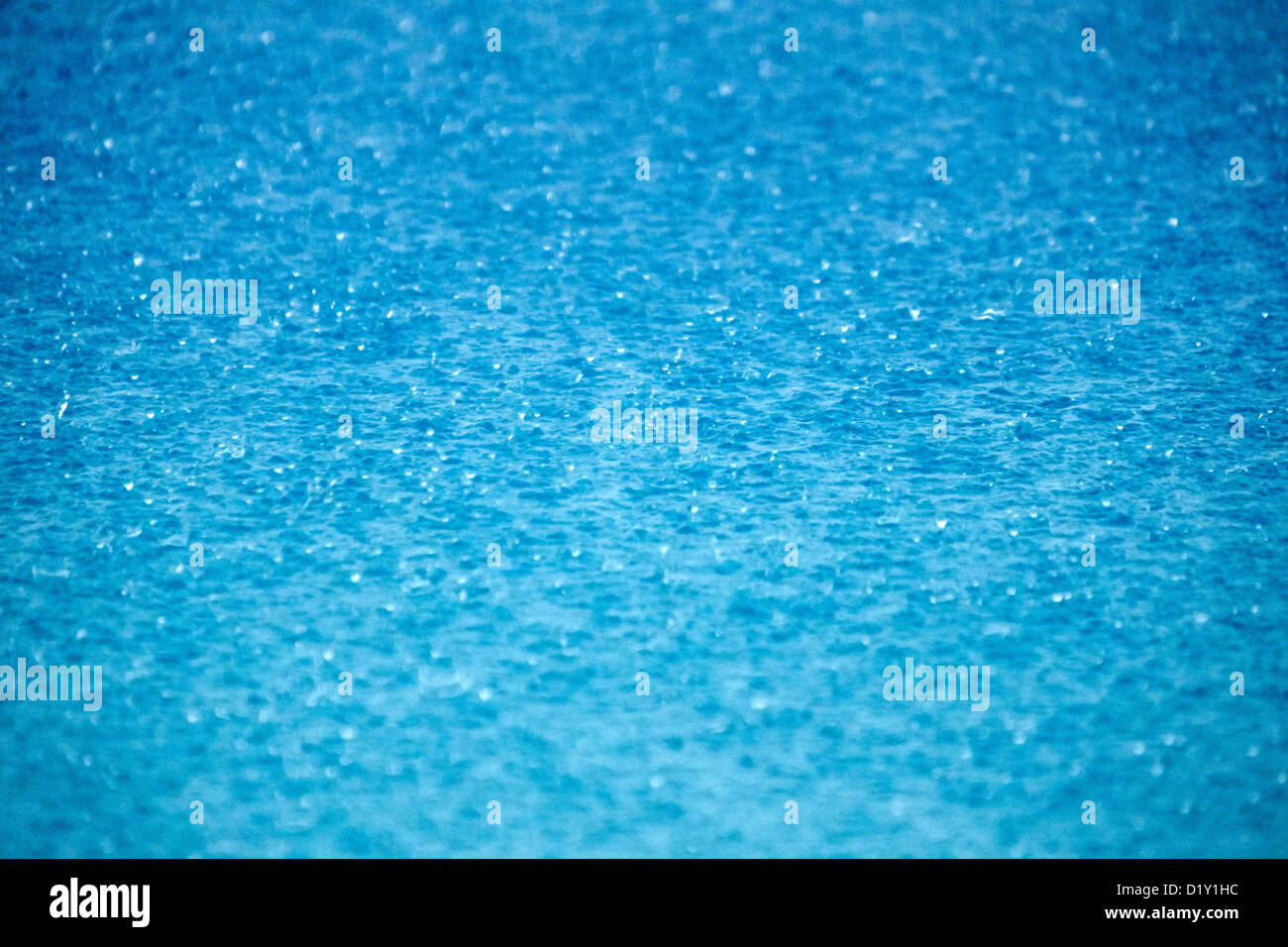 Heavy rain splashes in a swimming pool Stock Photo - Alamy