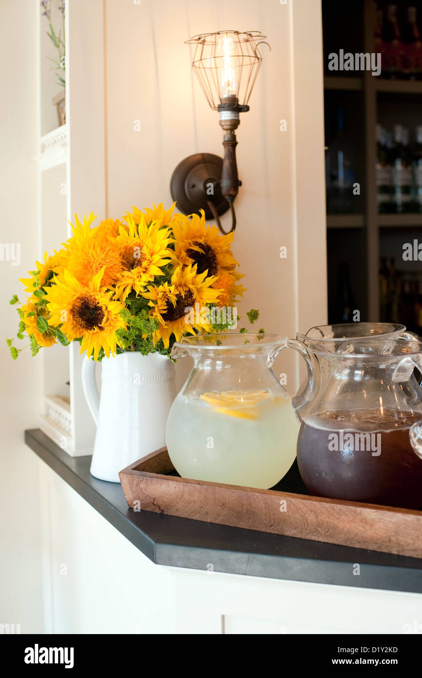 A pitcher of ice tea and lemonade on a cafe bar Stock Photo - Alamy