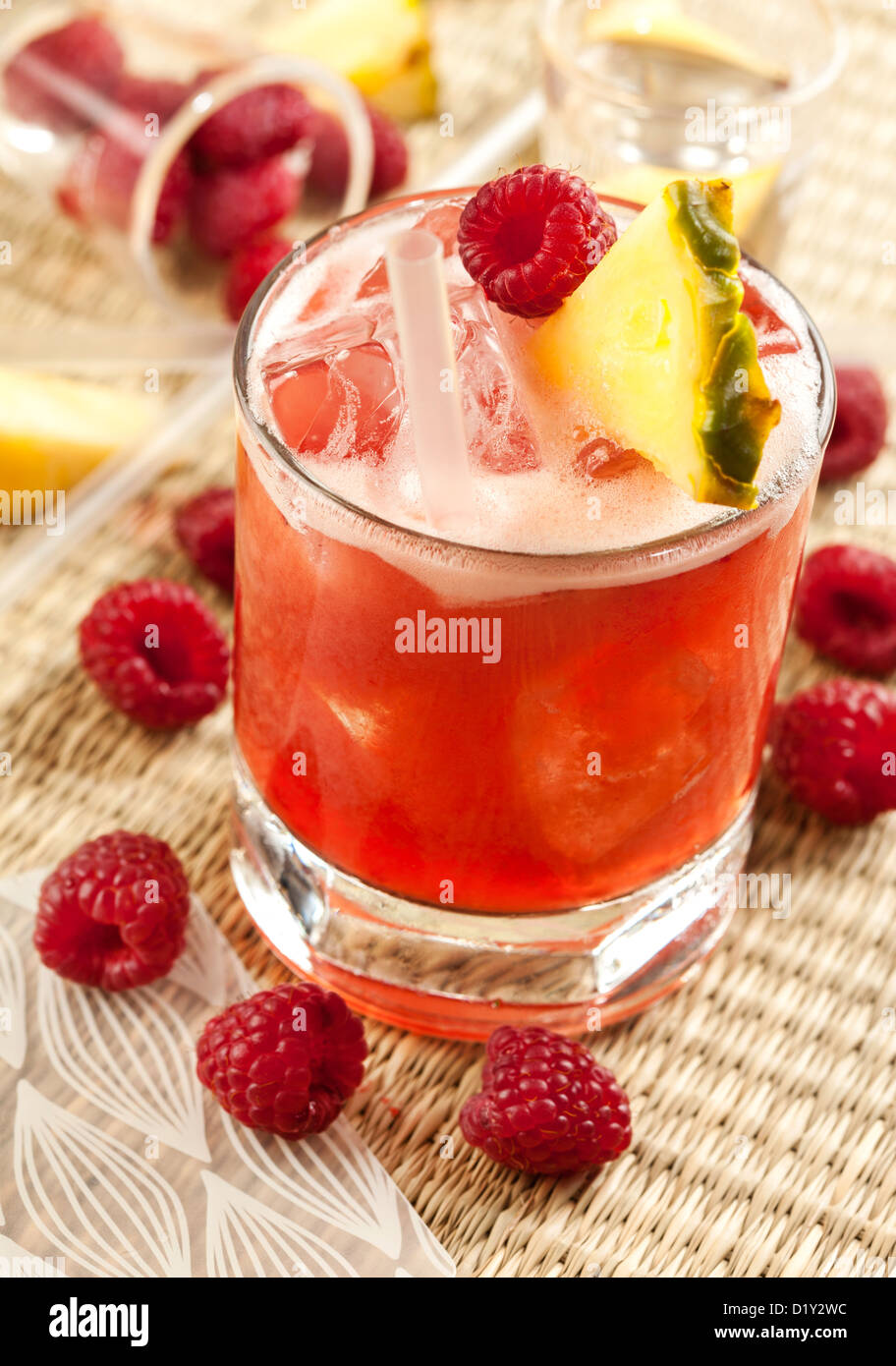 Drink with raspberry, pineapple and peach Stock Photo - Alamy