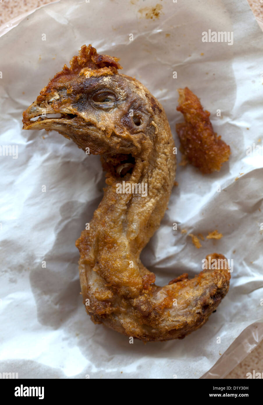 Deep Fried and Battered Chicken Head a delicacy in Asia - An example of ...