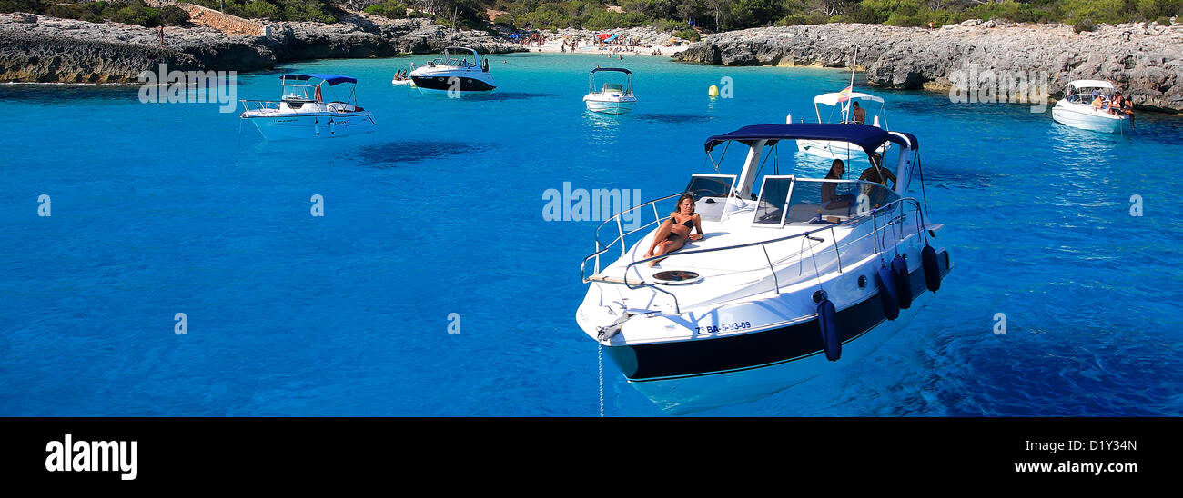Sailing boat in a small cove at Playa de Son Saura resort, Isle of ...