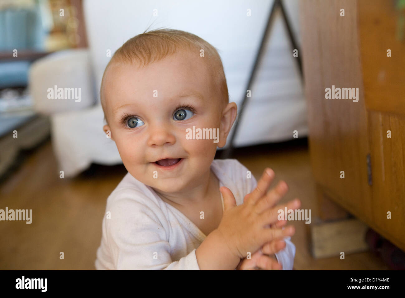 Baby laugh clap hi-res stock photography and images - Alamy
