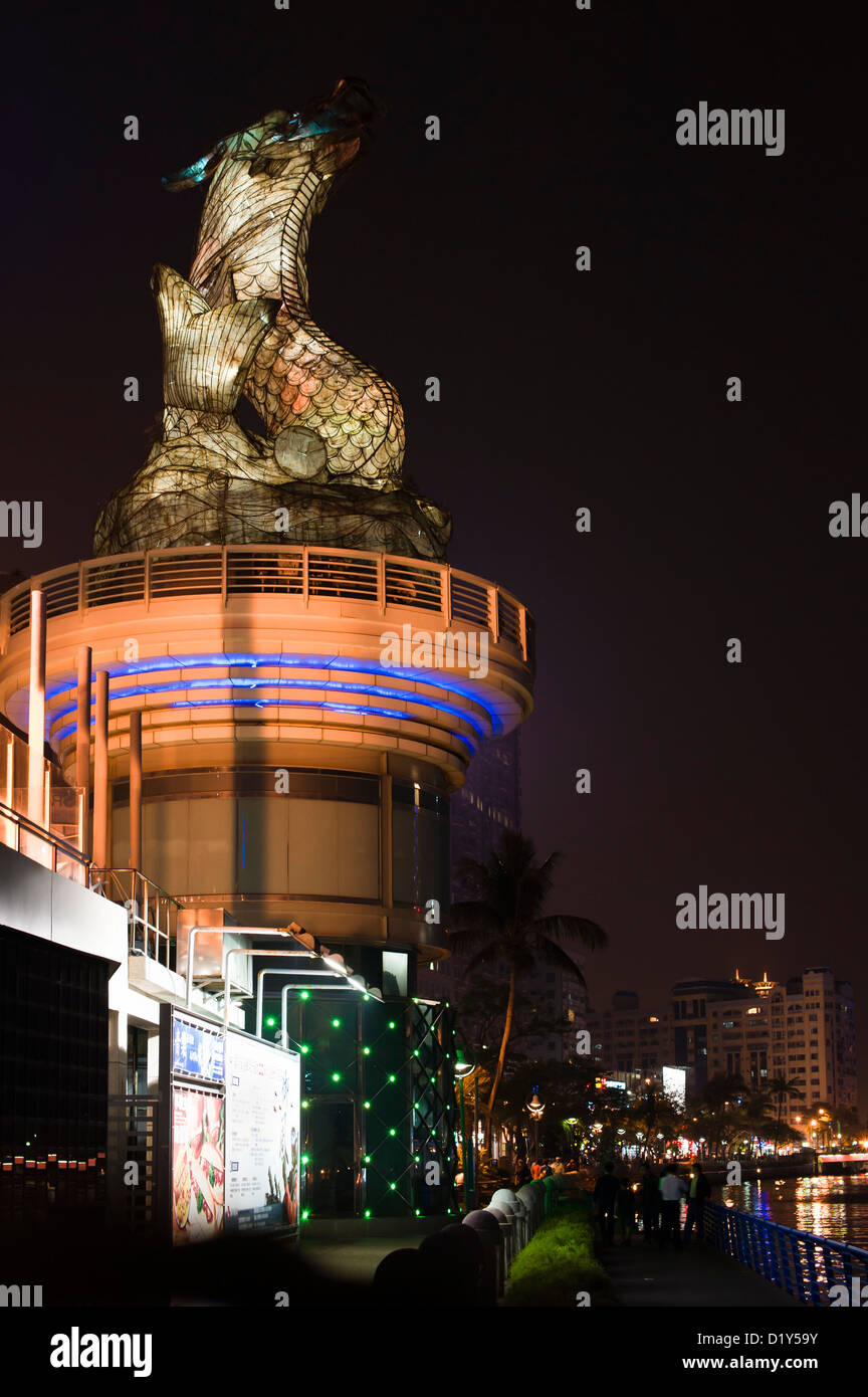 Dragon fish statue at night on the Love river, Kaohsiung Stock Photo ...
