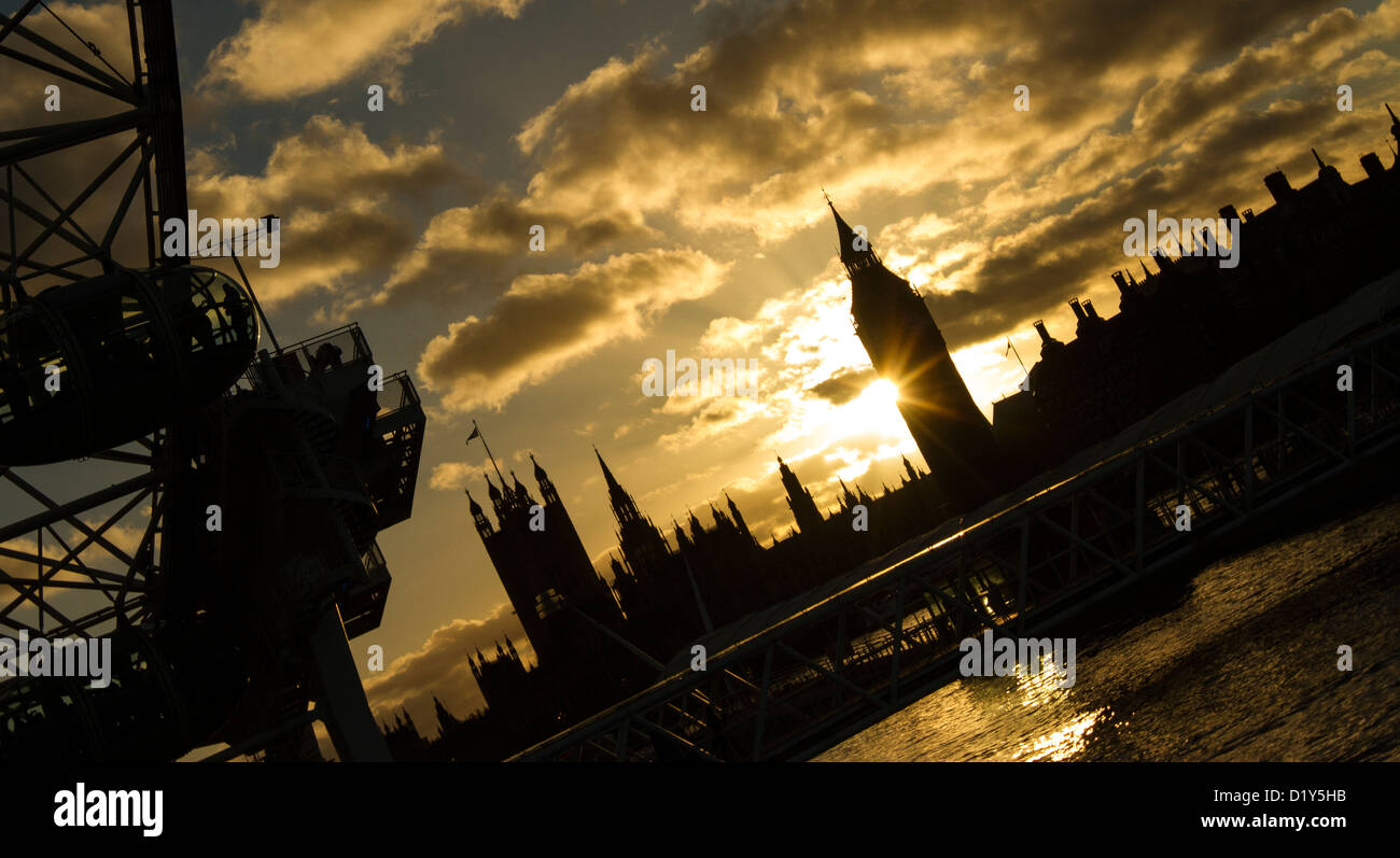 The sun sets on the first day of 2013, behind Big Ben with the London ...