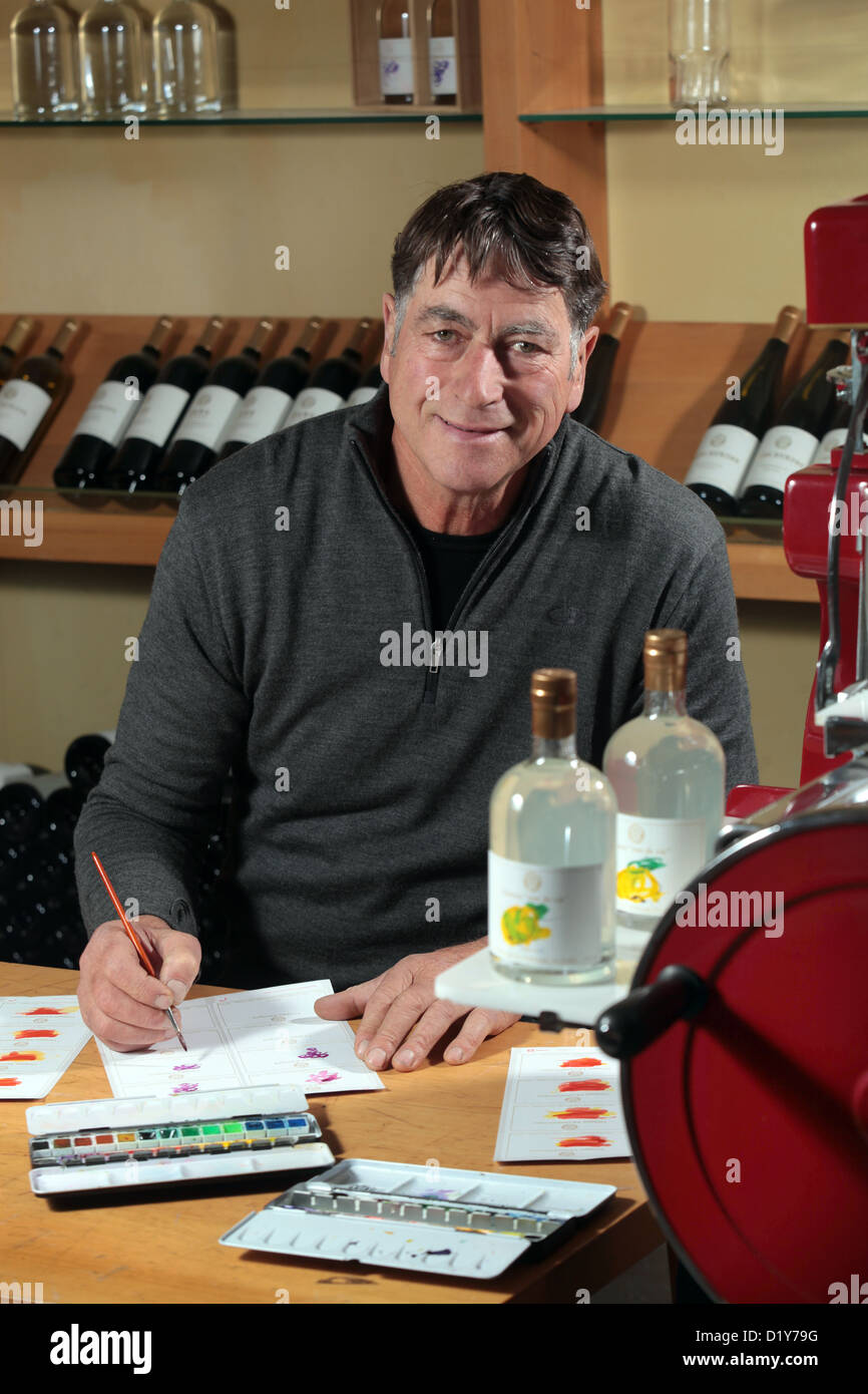 Winemaker Hans Hertzog making his own labels for the spirits his winery ...