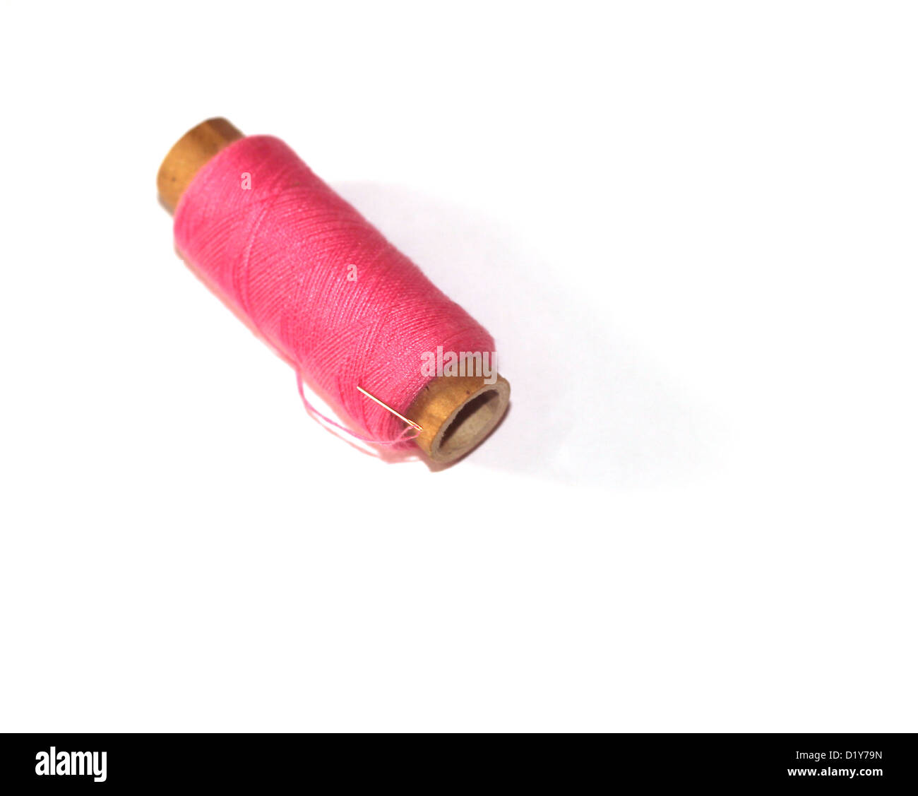 Thread reels over white background Stock Photo - Alamy