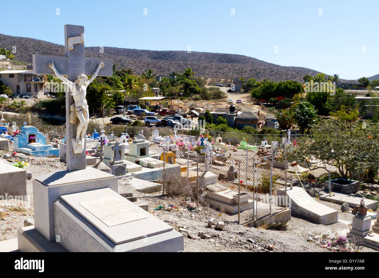 View of cemetery with work yard in background in Todos Santos, Baja ...