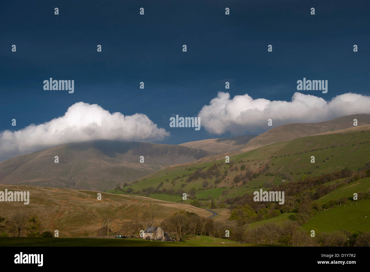 Low cloud forming over the Cautley Crag and The Calf in the Howgills on ...