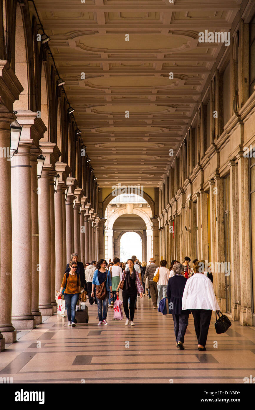 Arcaded walkways are a feature lining many streets in central Turin in ...