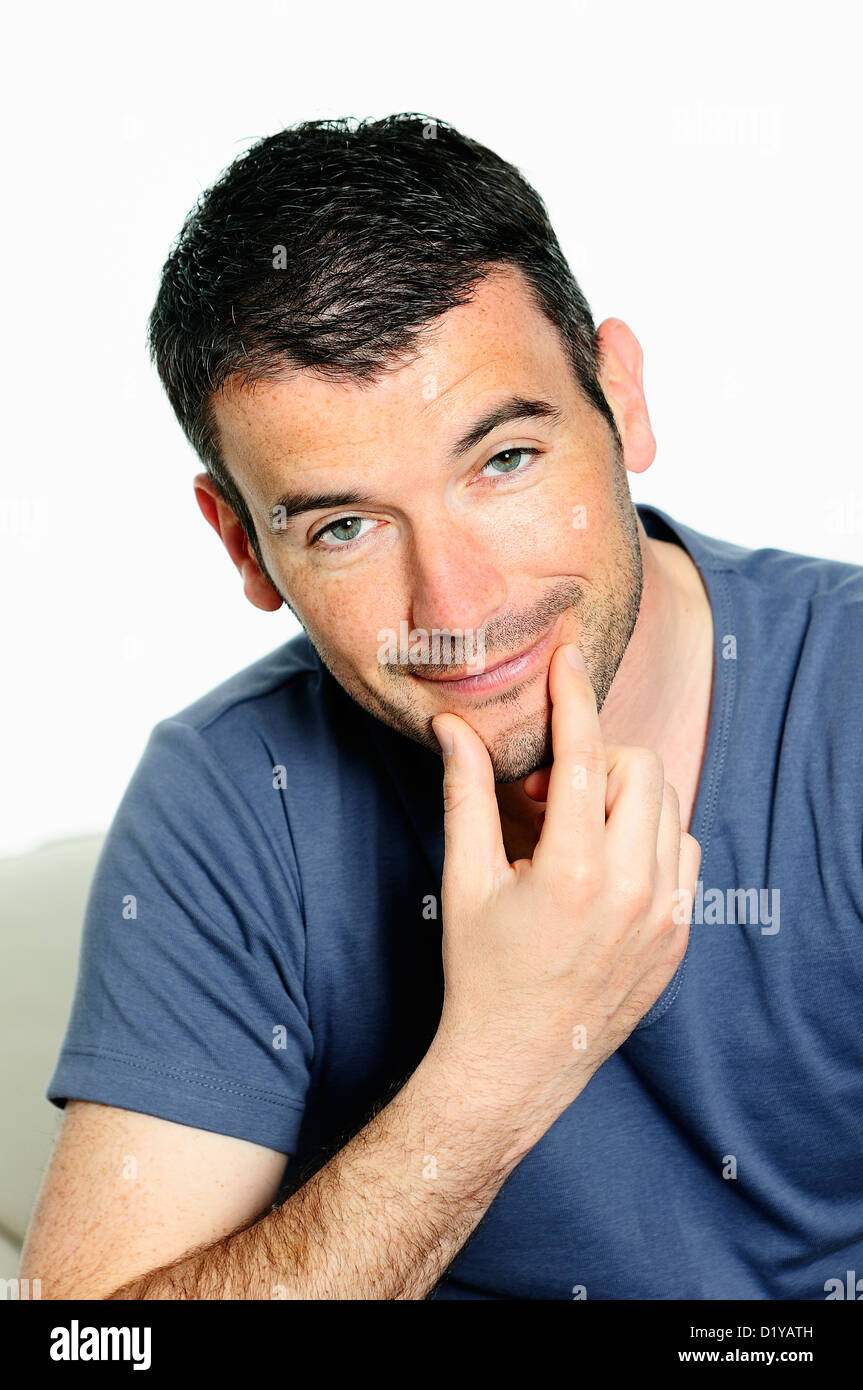 natural and relaxed looking young man Stock Photo - Alamy