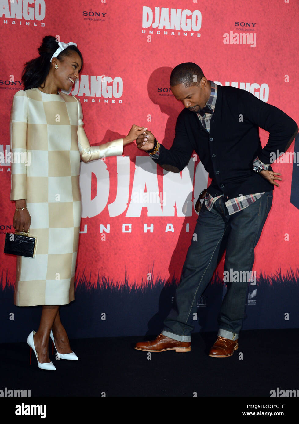 US actor Jamie Foxx (R) and US actress Kerry Washington pose during a ...