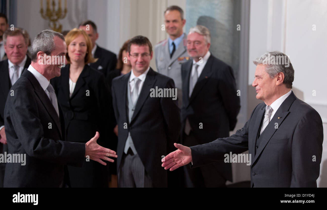 German President Joachim Guack (R) greets the American Ambassador to ...