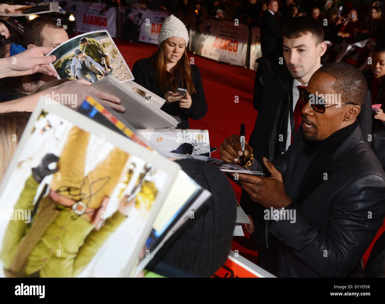 US actor Jamie Foxx (R) arrives for the premiere of 'Django Unchained ...