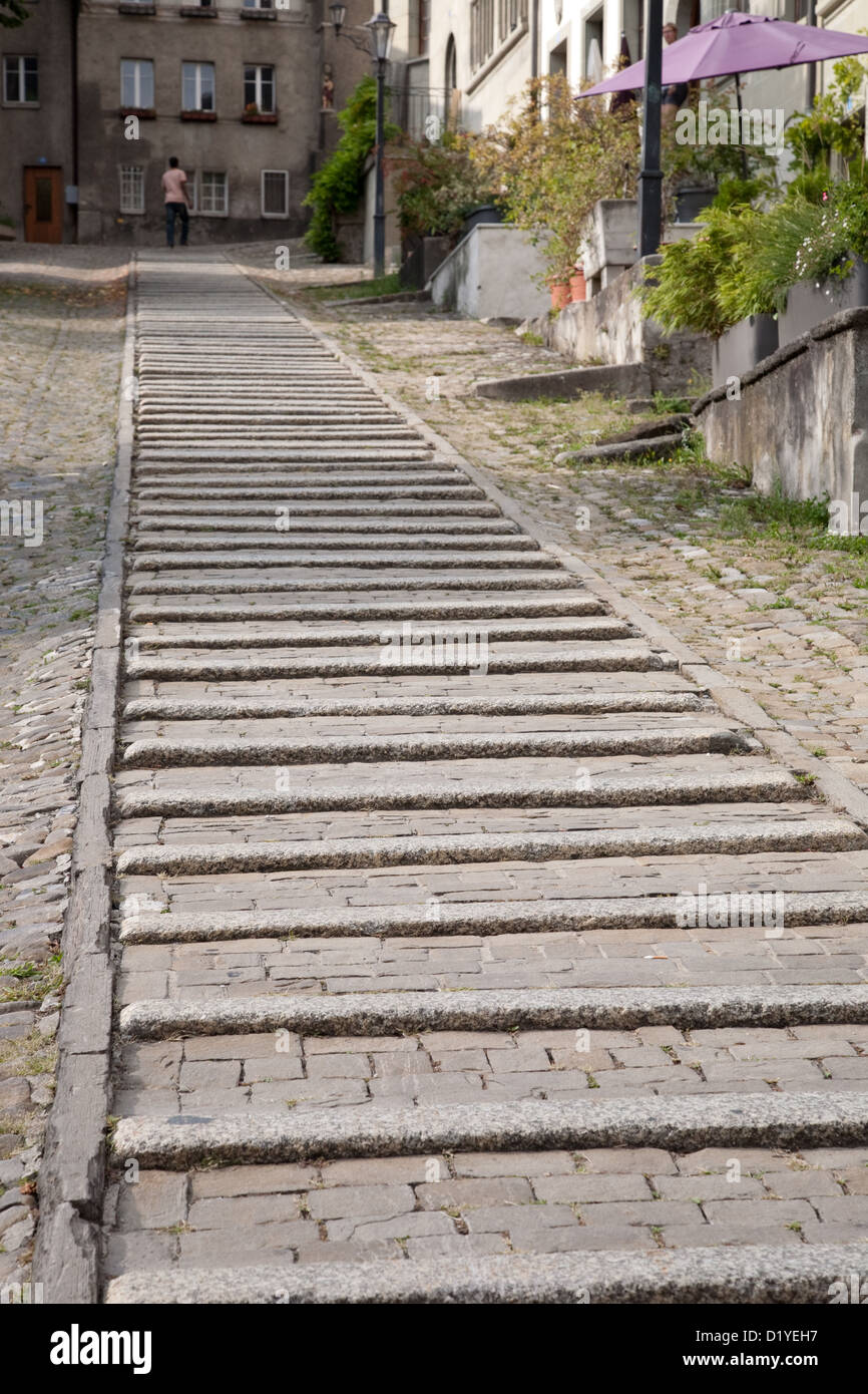 Cobbled Stone Steps Leading Up a Gentle Hill Stock Photo - Alamy