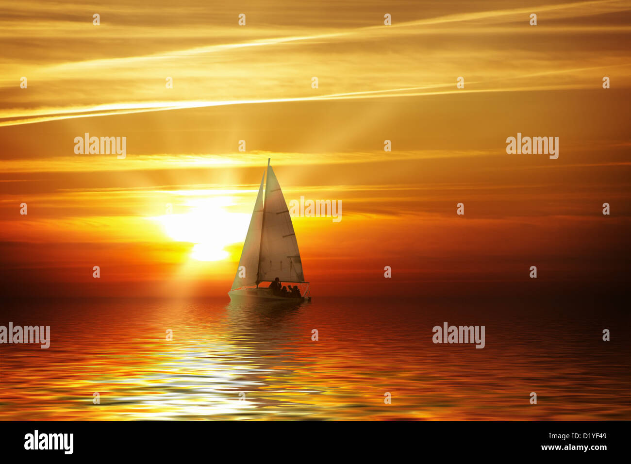 Sailing at sunset Stock Photo - Alamy