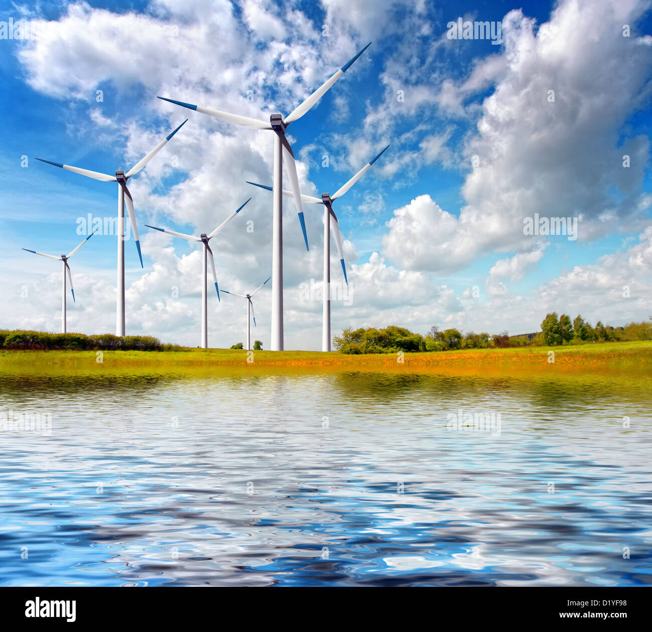 Windmill on spring field Stock Photo - Alamy
