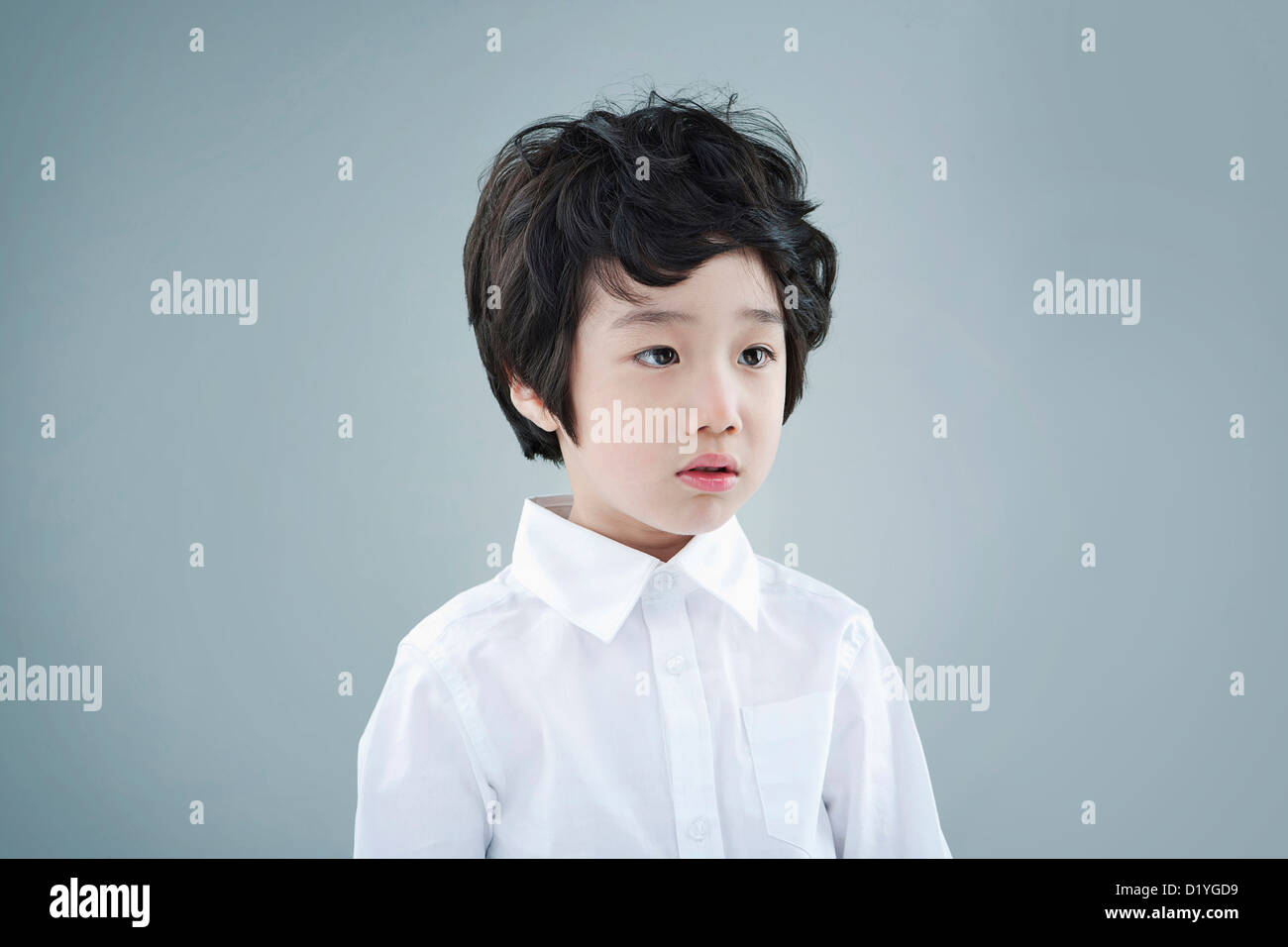 a boy looking confused Stock Photo - Alamy