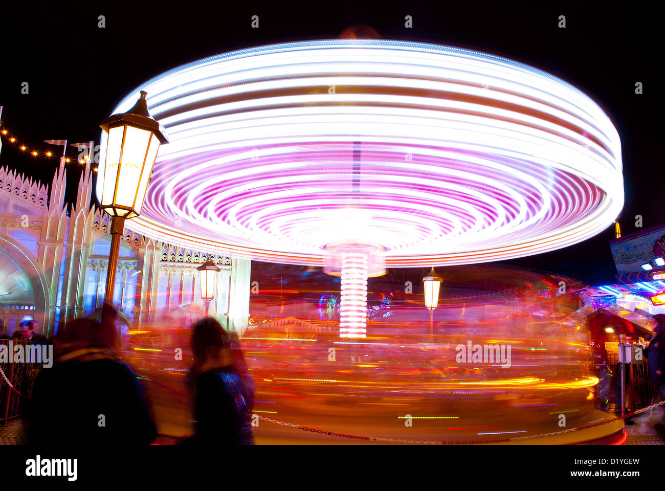 long exposure pictures of amusement park rides and wheels at night ...