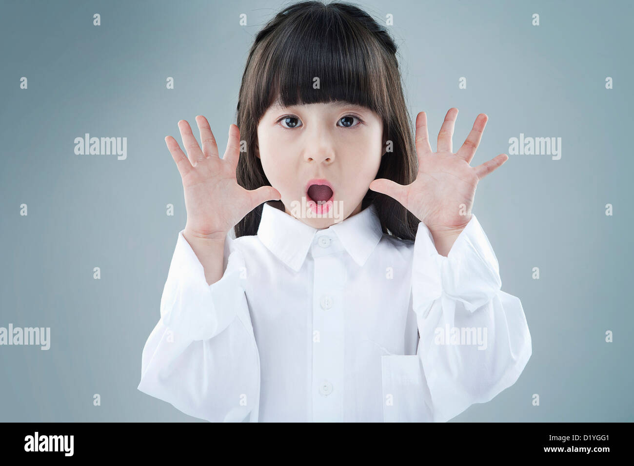 a female kid being surprised Stock Photo - Alamy