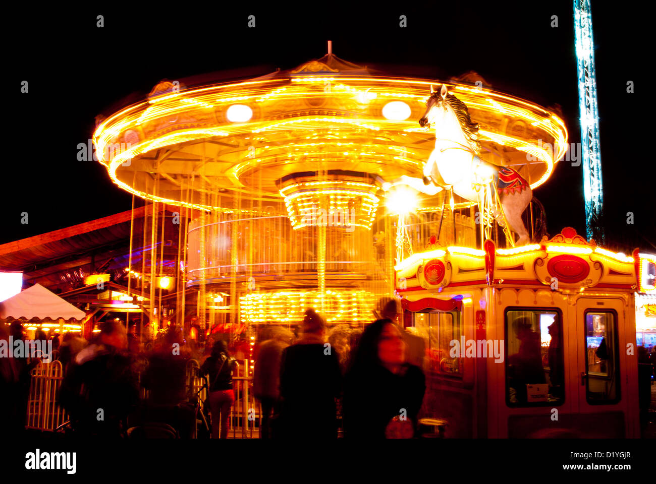long exposure pictures of amusement park rides and wheels at night ...