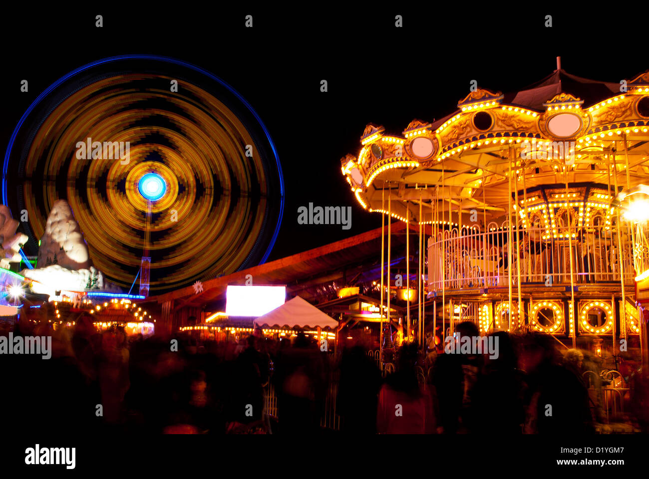 long exposure pictures of amusement park rides and wheels at night ...